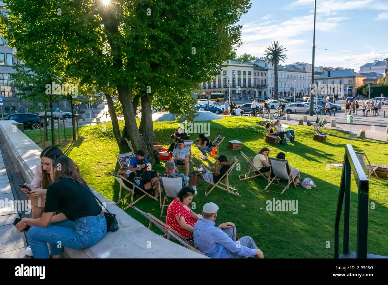 Warsaw, Poland, Crowd of People Sharing Drinks Outside Cafe, Bar ...