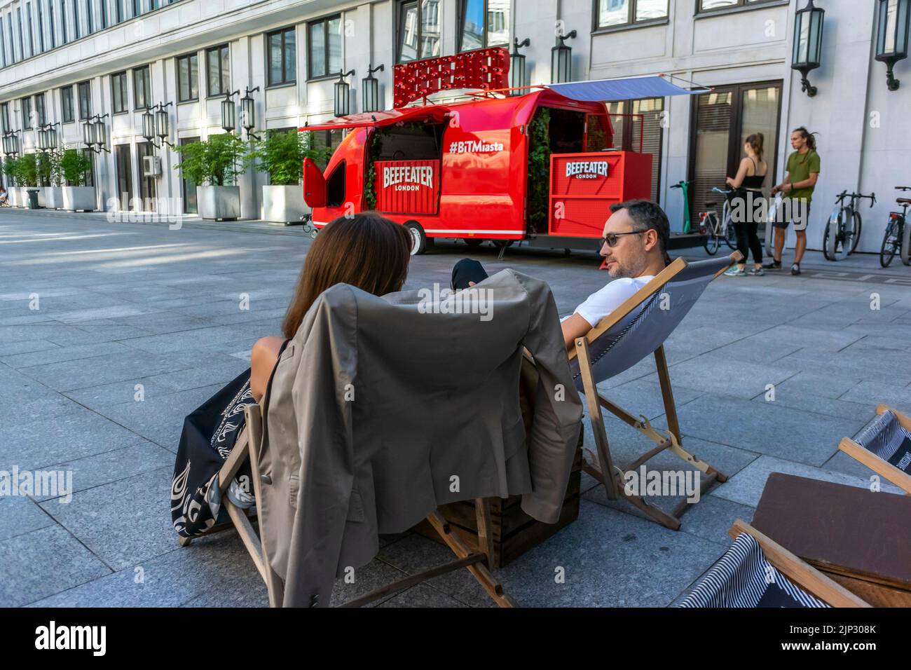 Warsaw, Poland, People Sitting in Lounge Bar Chairs Local Cafe, on Town ...