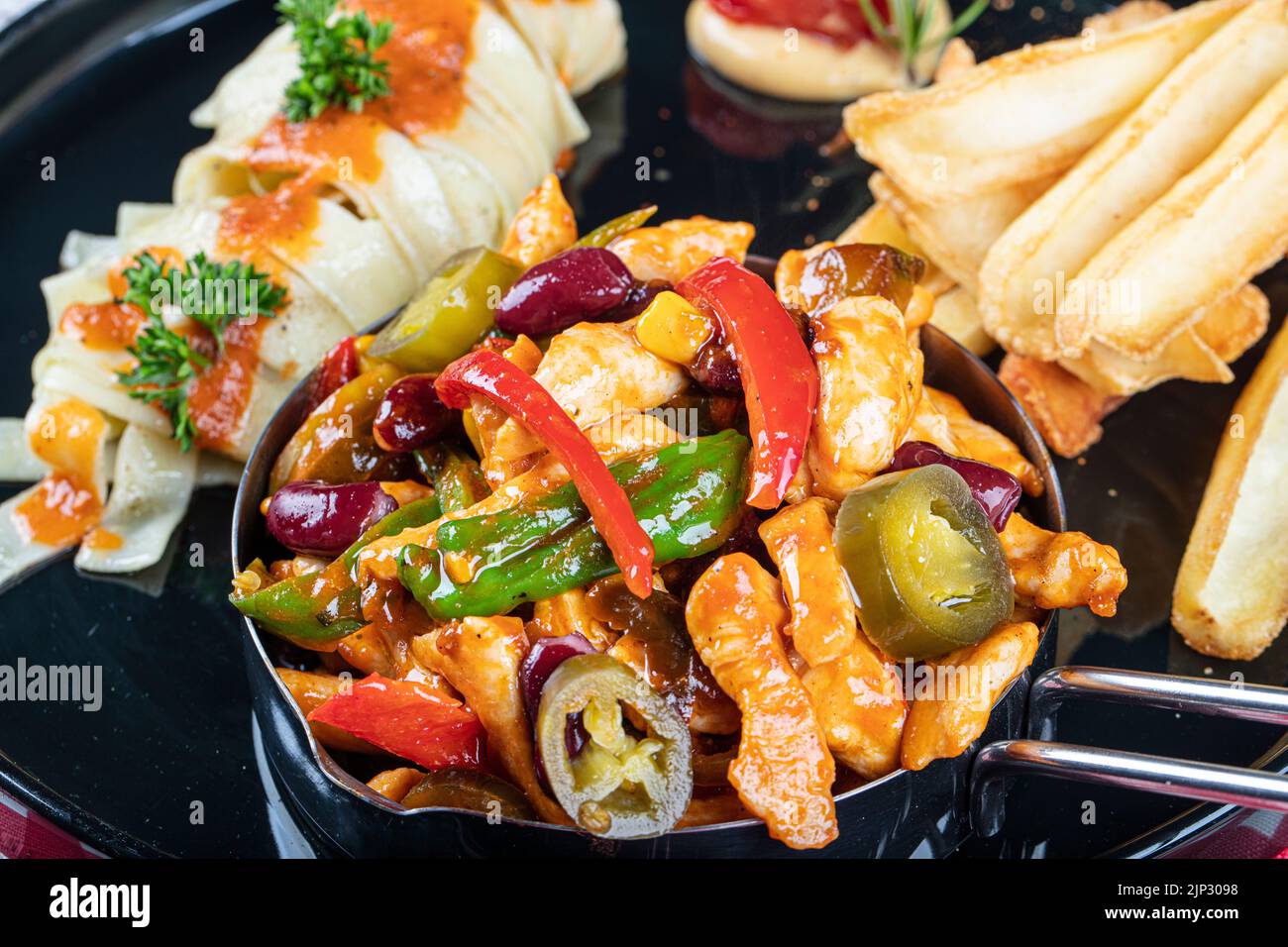 Fried Chicken with Hot Pepper Sauce. The appetizer is served with ...