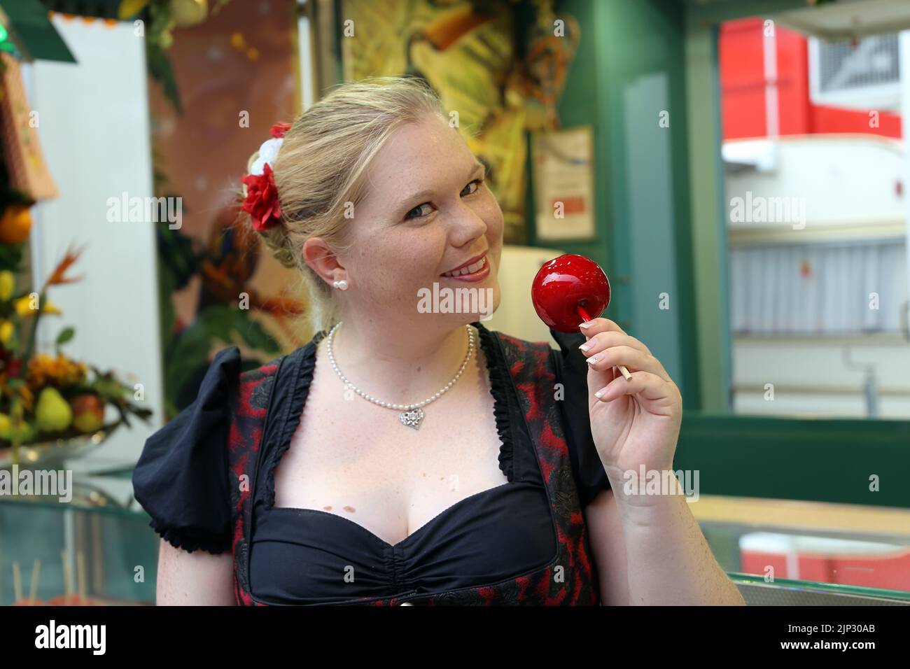 Woman with traditional german costume at a (german) fair (model ...