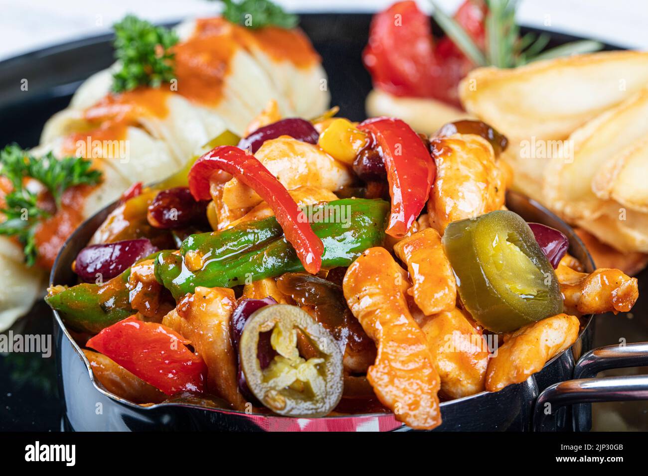 Fried Chicken with Hot Pepper Sauce. The appetizer is served with ...