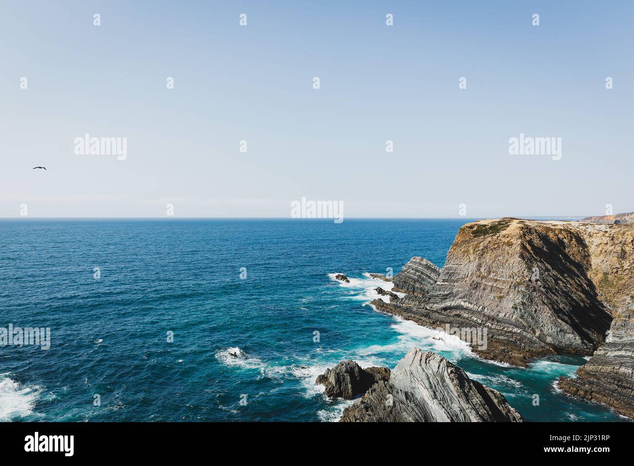 An aerial view of a sea and cliffs around Stock Photo - Alamy