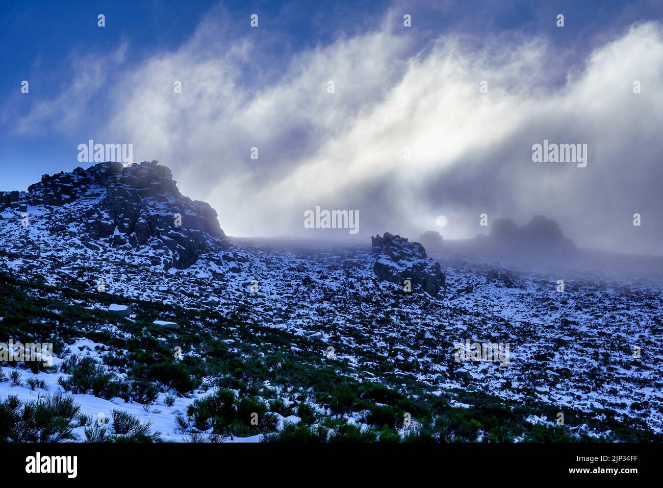 Snowy landscape of the Madrid mountain, white snow covering the ground ...