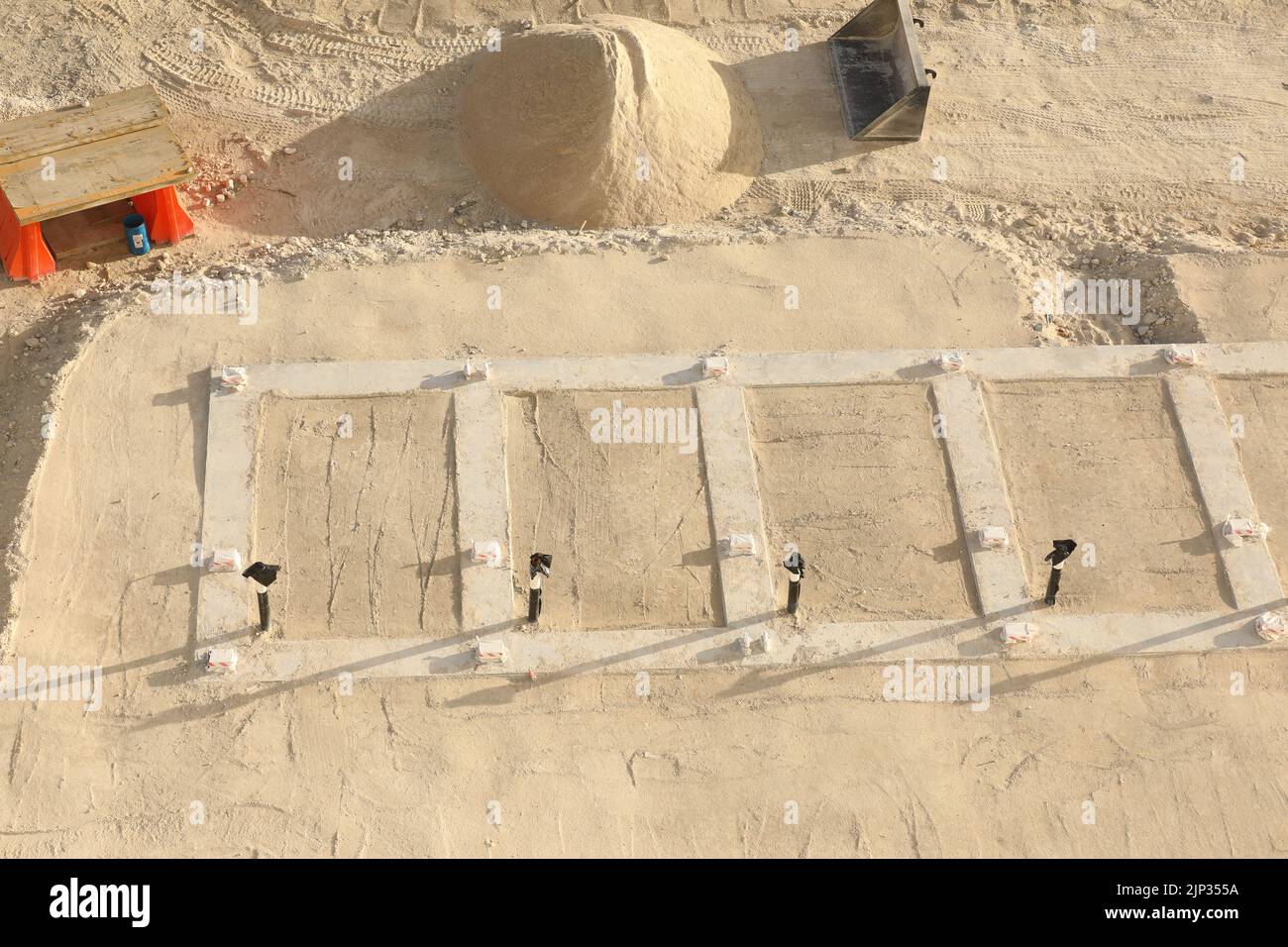 Piling driven into ground. Deep foundation installation. Reinforce ...