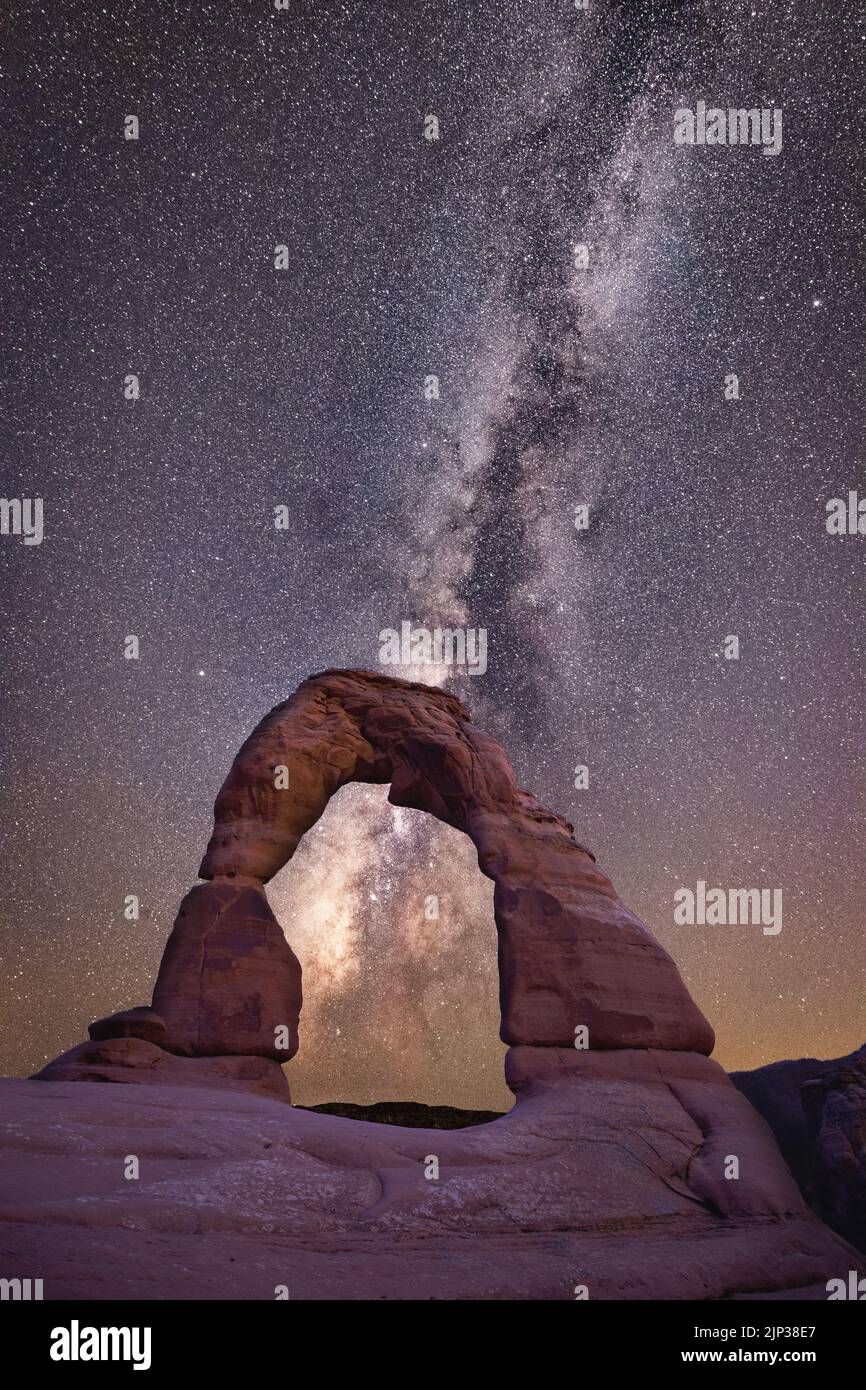 A beautiful scenery of Delicate Arch with the Milky Way galaxy in the ...