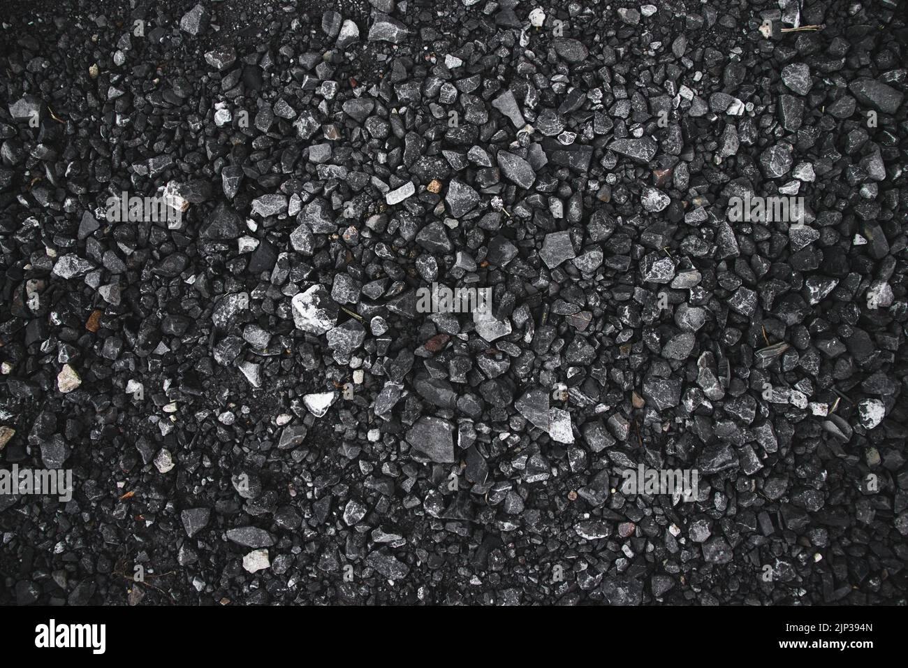 A top view of black gravel- background for wallpapers Stock Photo - Alamy