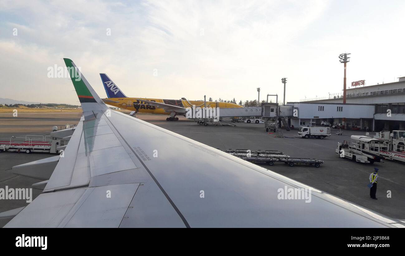 A closeup of a plane wing at an airport in Japan Ishikawa Stock Photo ...