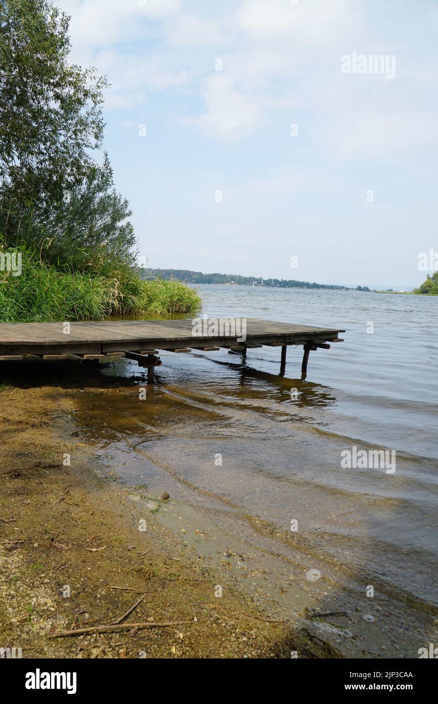 wooden boat landing stage Stock Photo - Alamy