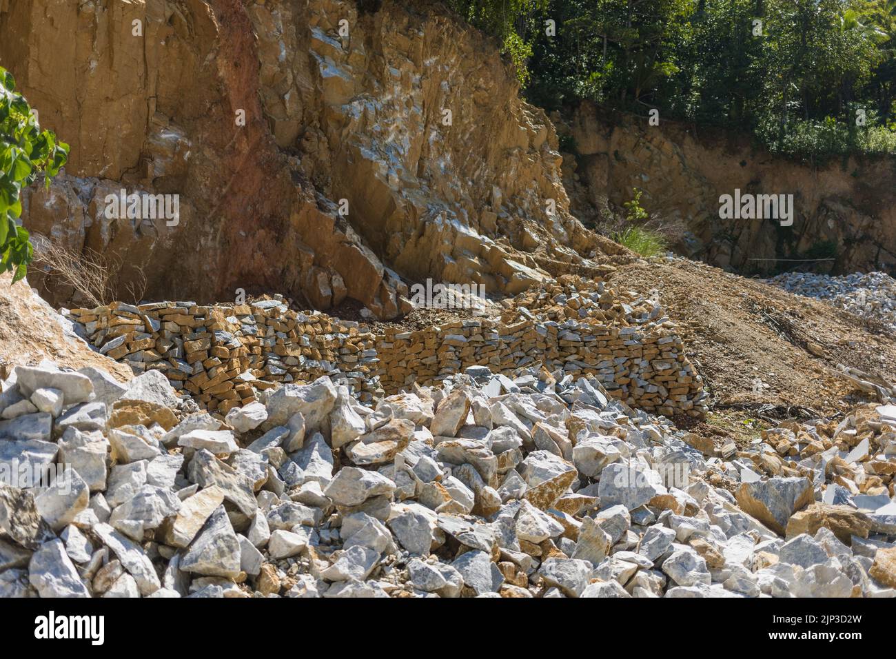 A pile of stones near the cliff Stock Photo - Alamy