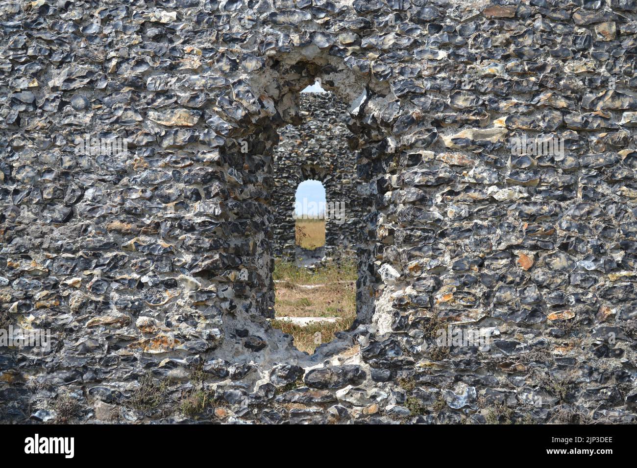 The oval opening on stone wall of Neptune's Tower historical landmark ...