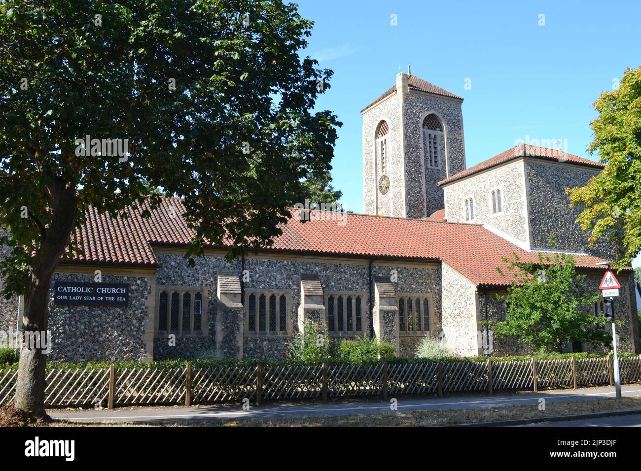 The Our Lady Star of The Sea Roman Catholic Church against blue sky ...