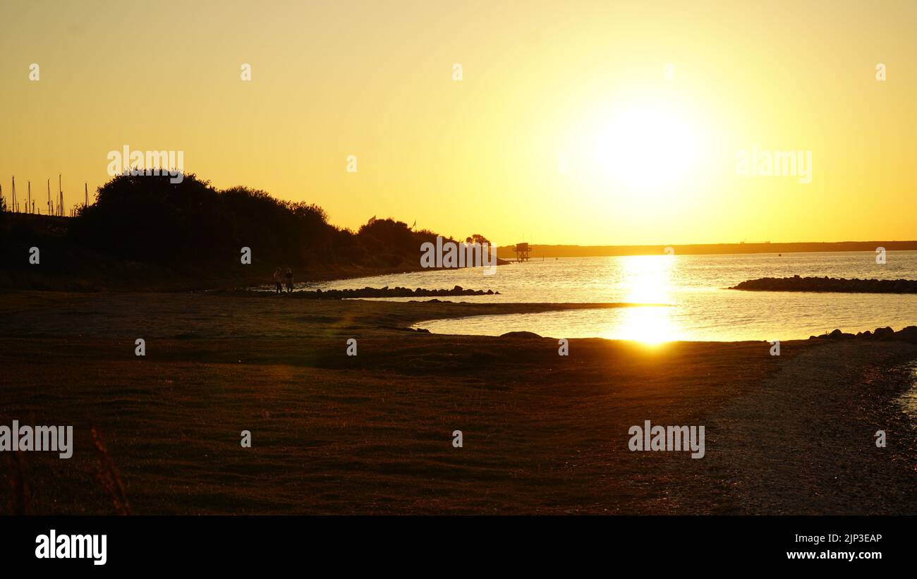 sunset golden hour reflection sea Stock Photo - Alamy