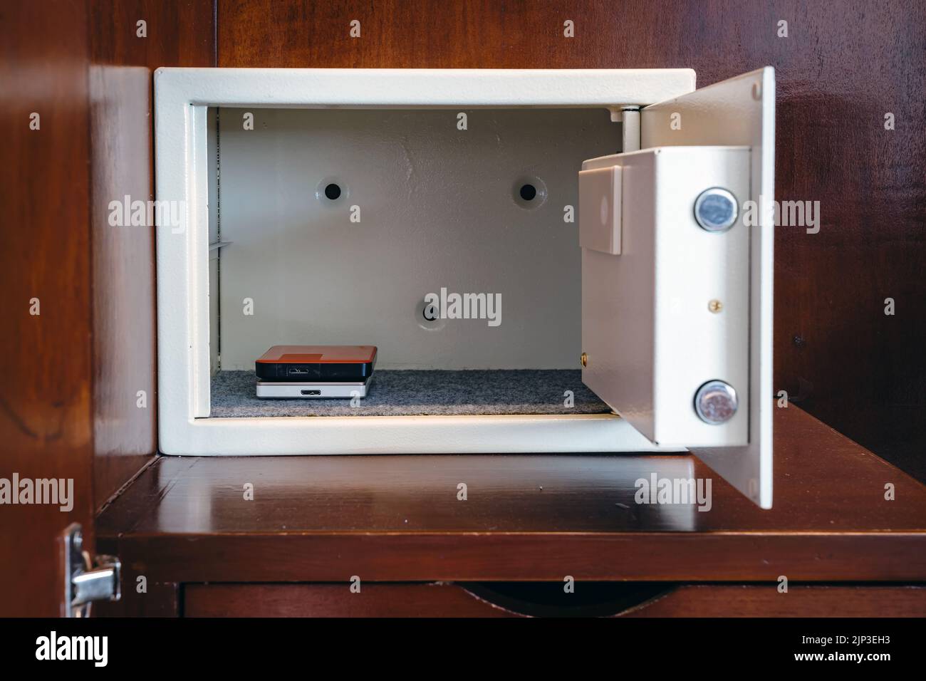 Security external hard drive in open metal safe. External hard disk ...