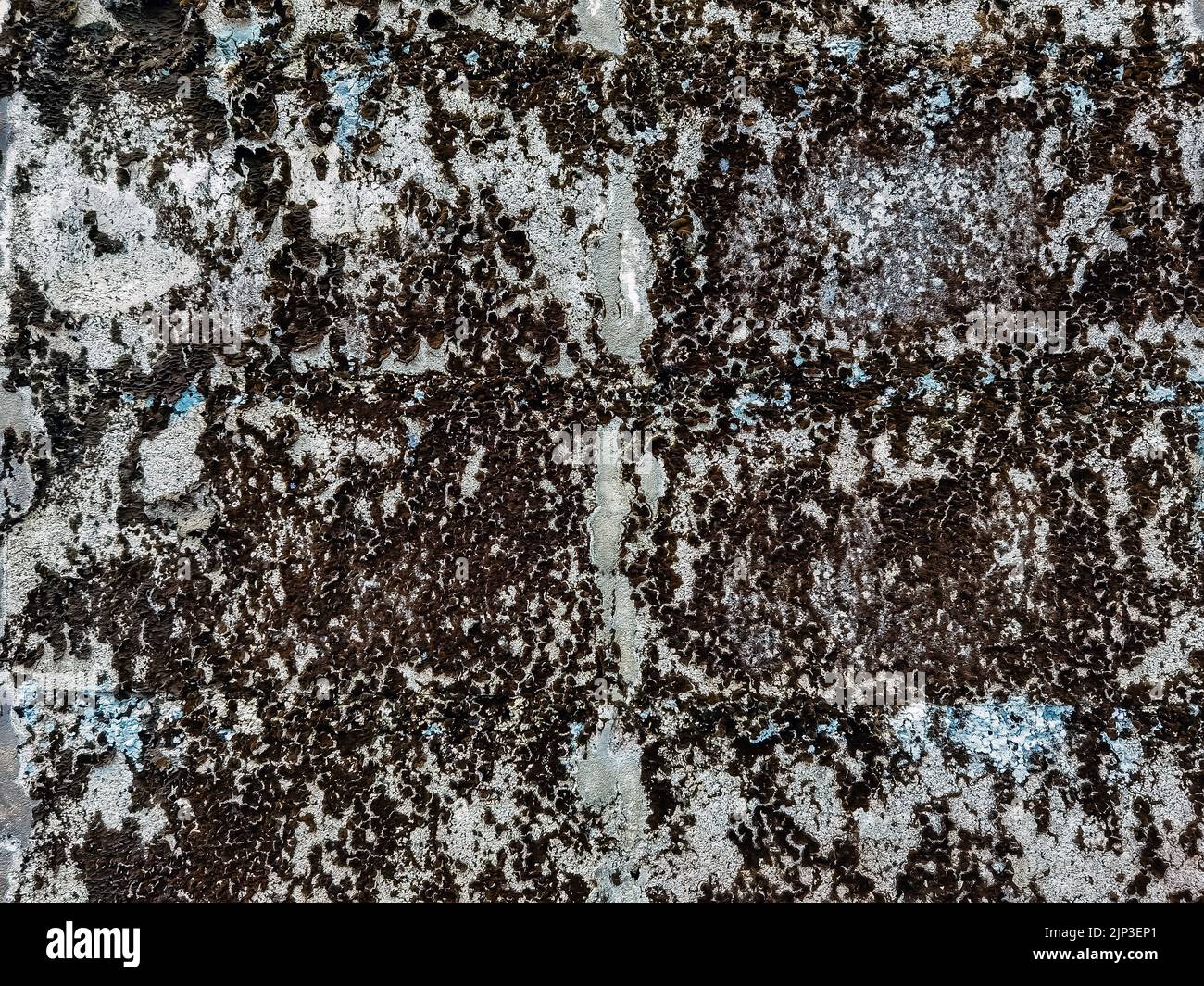 Dirty old eroded cracked plaster cement block fence. Concrete block ...