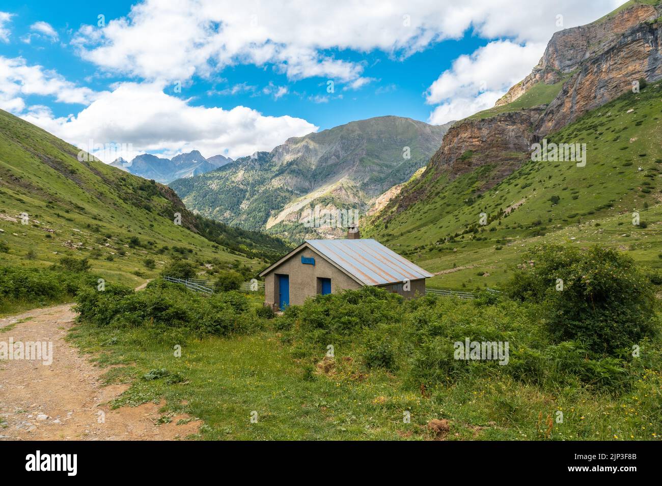 A wooden house in the middle of the mountain Stock Photo - Alamy