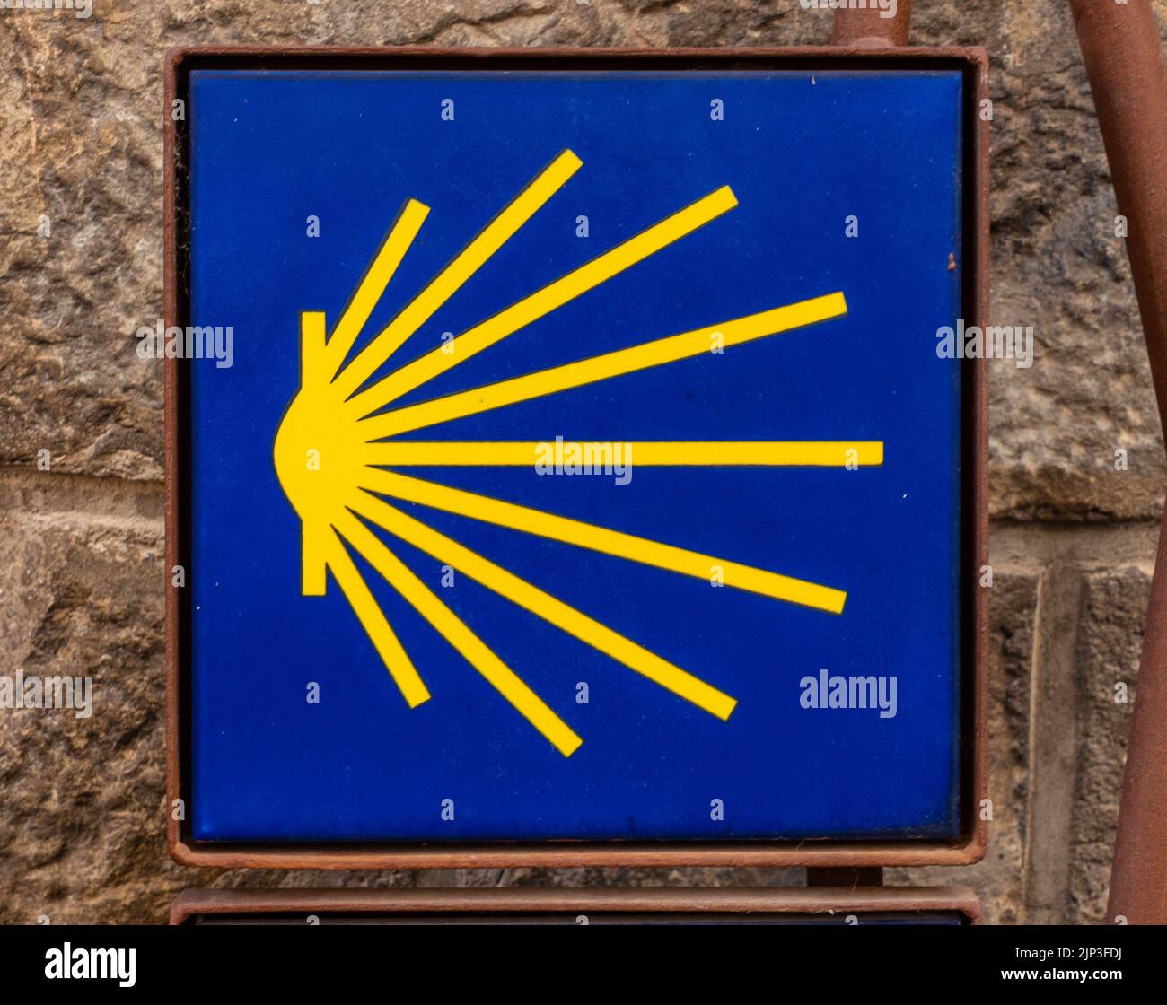 Blue plaques sign of the way to Santiago next to the Cathedral of San ...