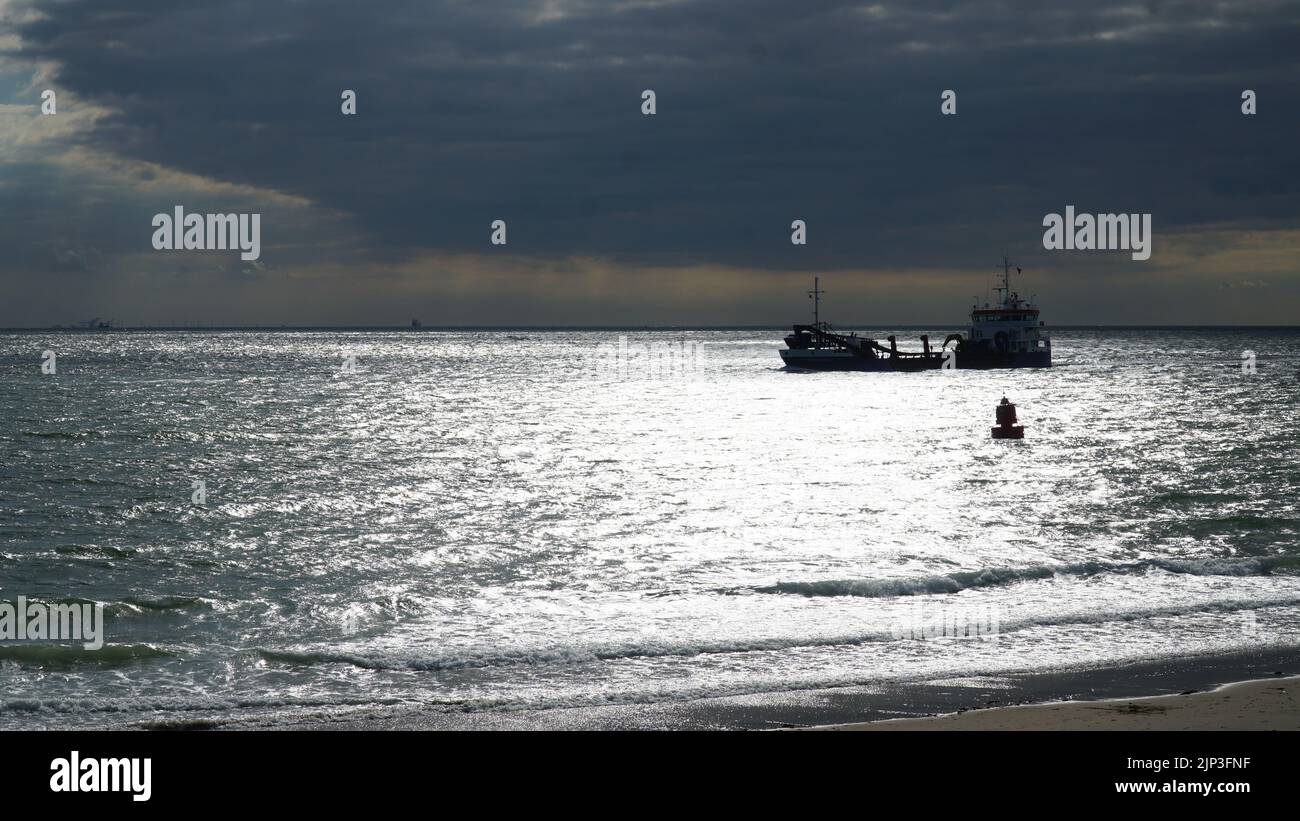 silver shining water sunset ocean Stock Photo - Alamy