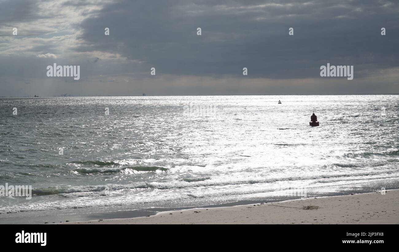 silver shining water sunset ocean Stock Photo - Alamy
