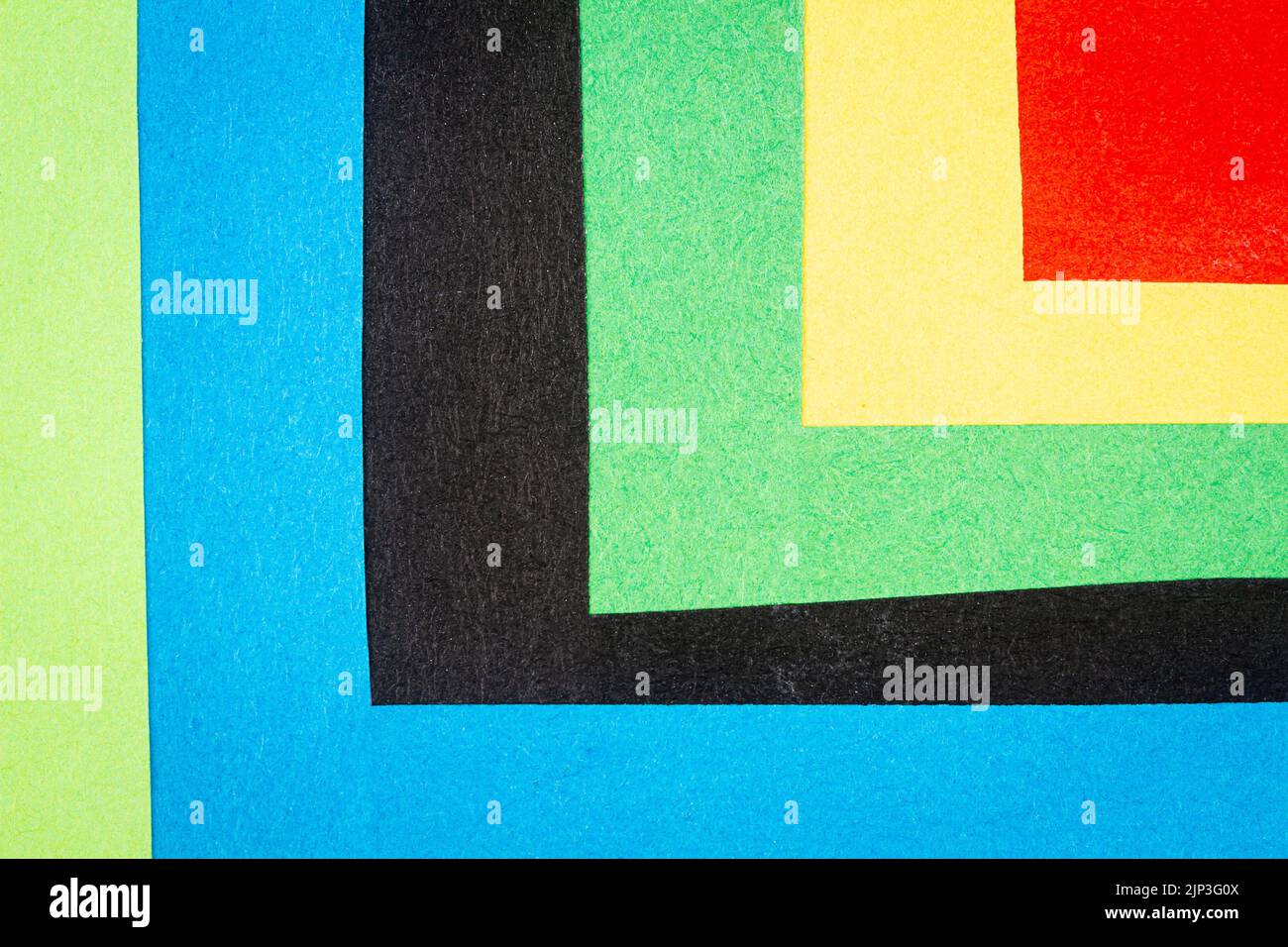 Multicolor background from a paper of different colors. Abstract ...