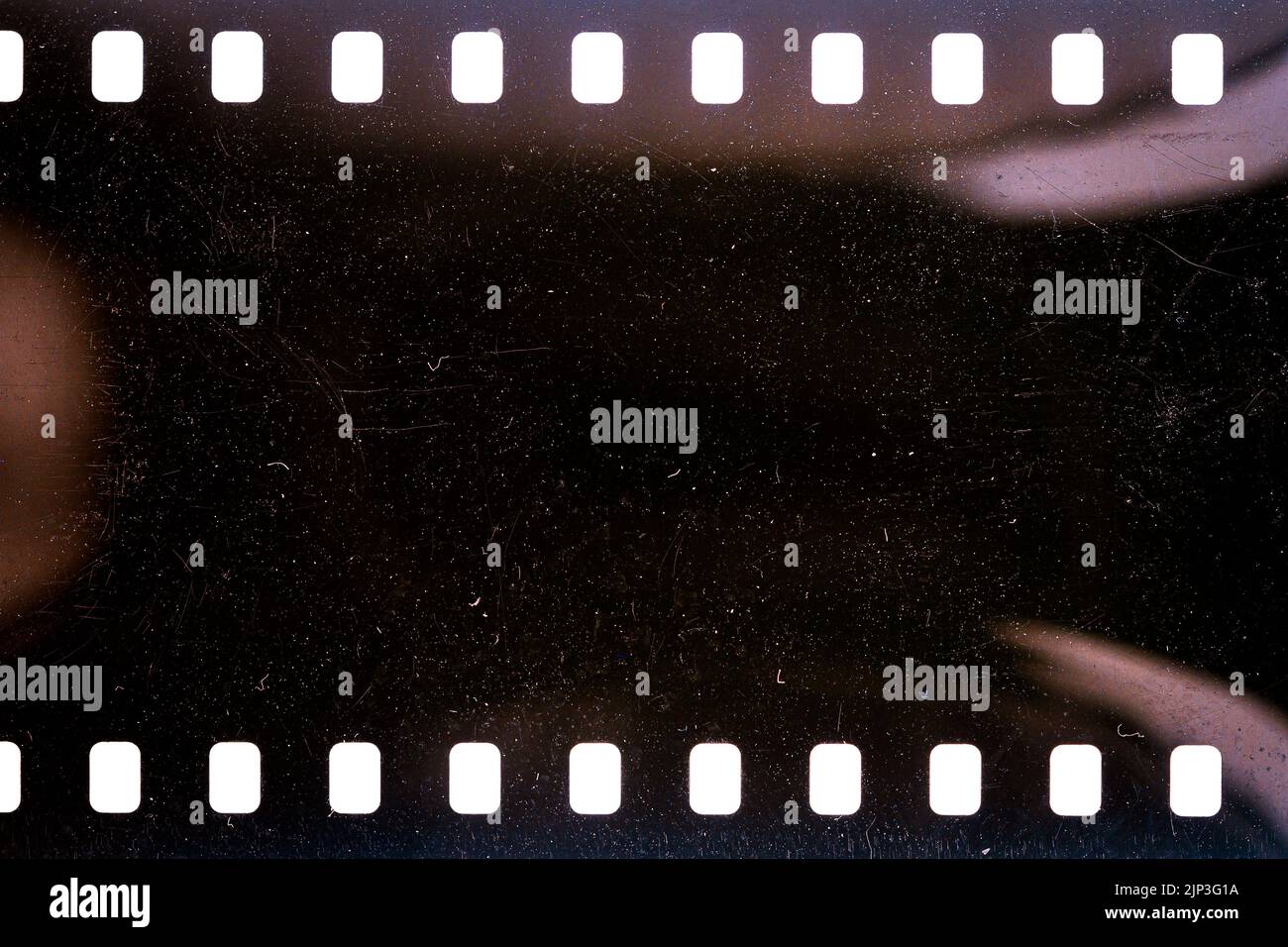 Dusty and grungy 35mm film texture or surface. Perforated scratched ...