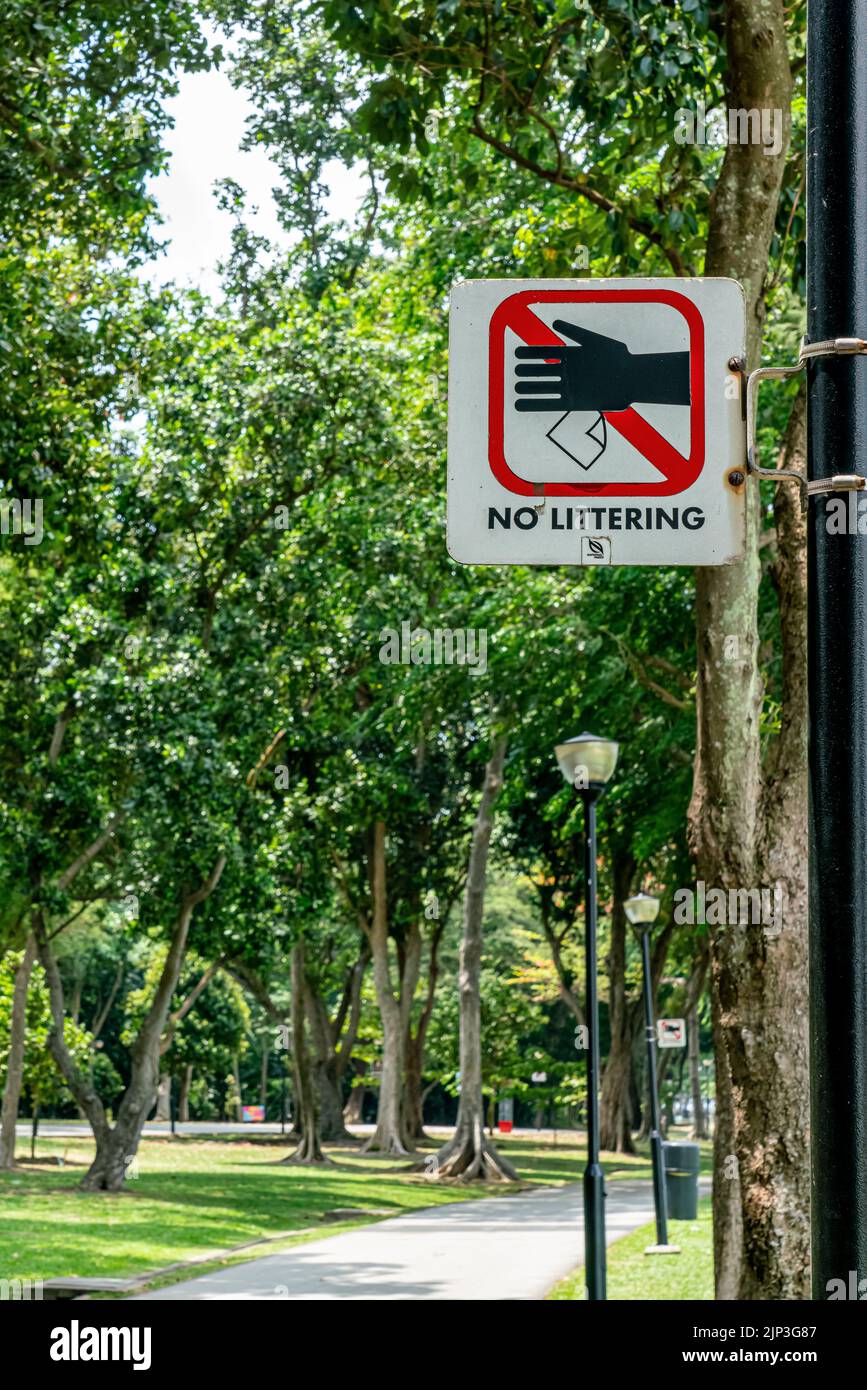 No littering sign at East Coast Park, Singapore. Vertical Shot Stock ...