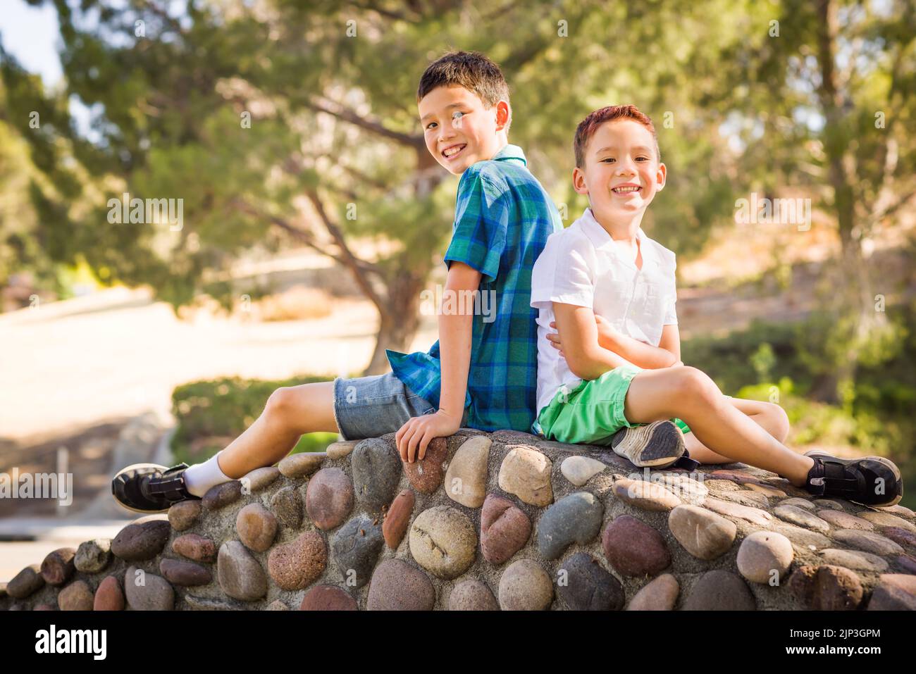 Outdoor portrait of mixed race Chinese and Caucasian brothers Stock ...