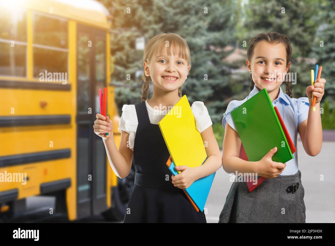 Little kids schoolchildren pupils students, the school bus. Welcome ...