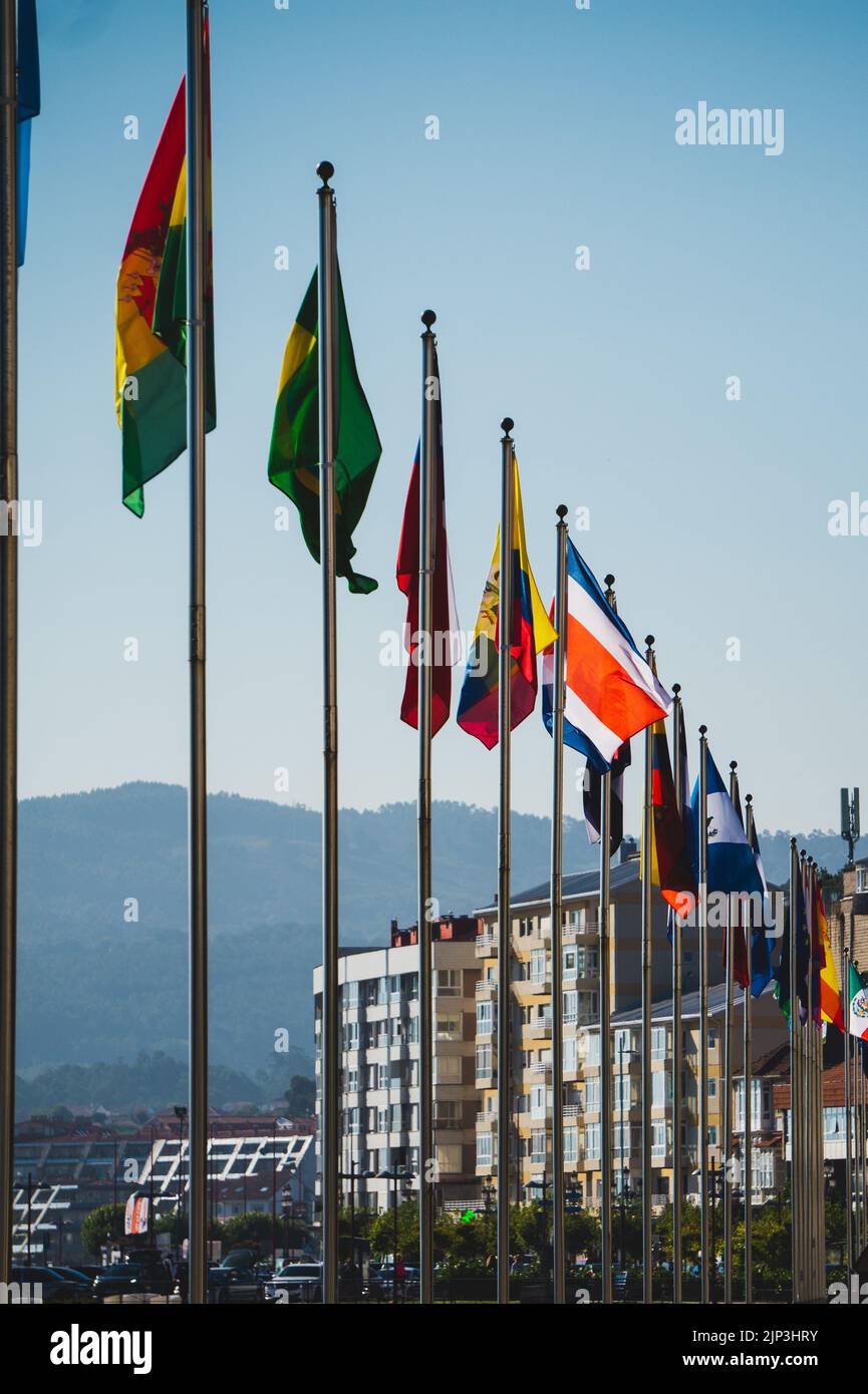 A vertical shot of the different county flags against the background of ...