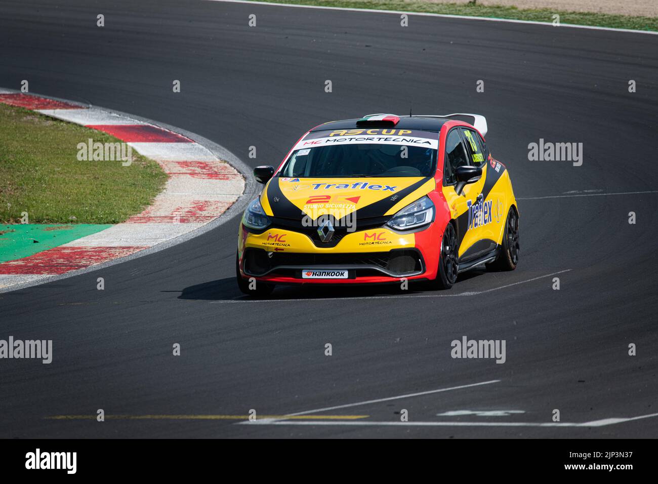 Racing car Renault Clio action on racetrack championship trophy ...
