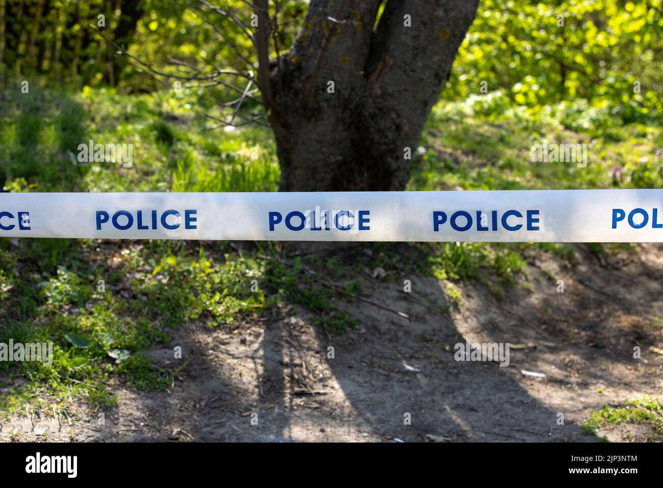 a close-up with a tape with the inscription Police, crime scene Stock ...