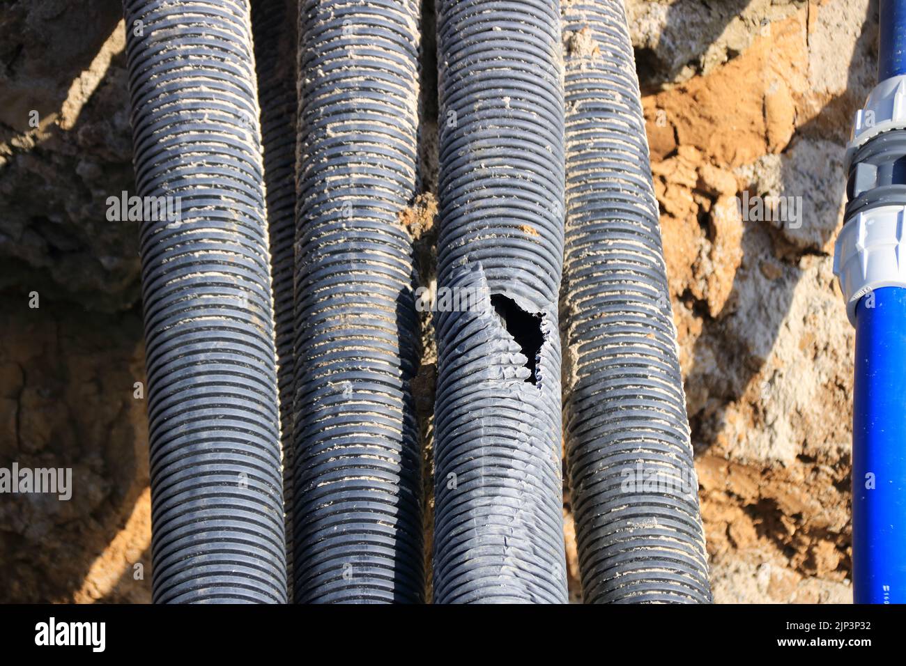 empty pipe for cables in a ditch was damaged during work Stock Photo - Alamy