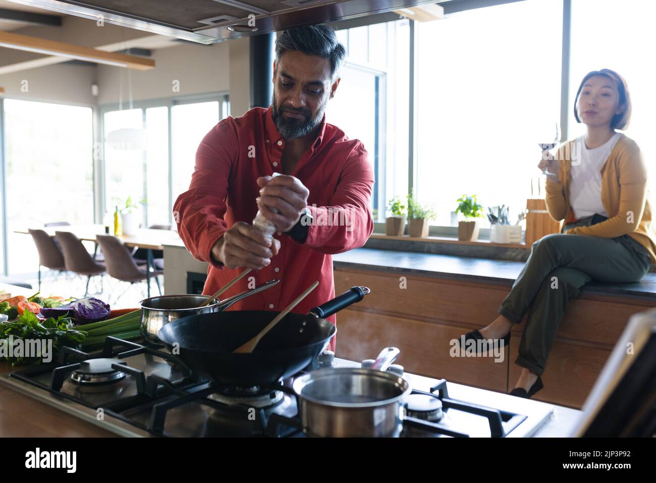 Family preparing for dinner hi-res stock photography and images - Alamy