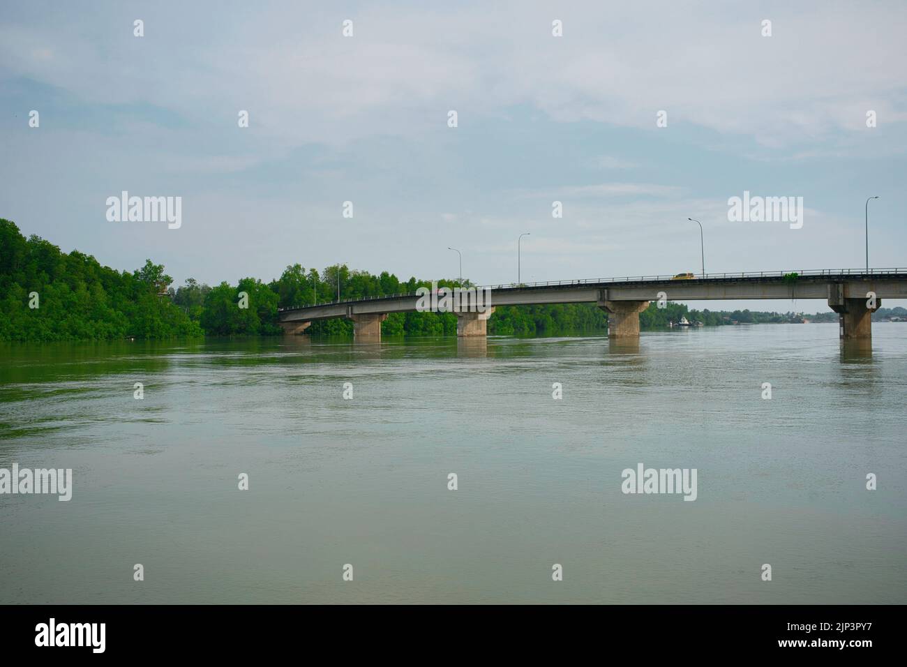 A simple bridge across the wide river for motorway Stock Photo - Alamy