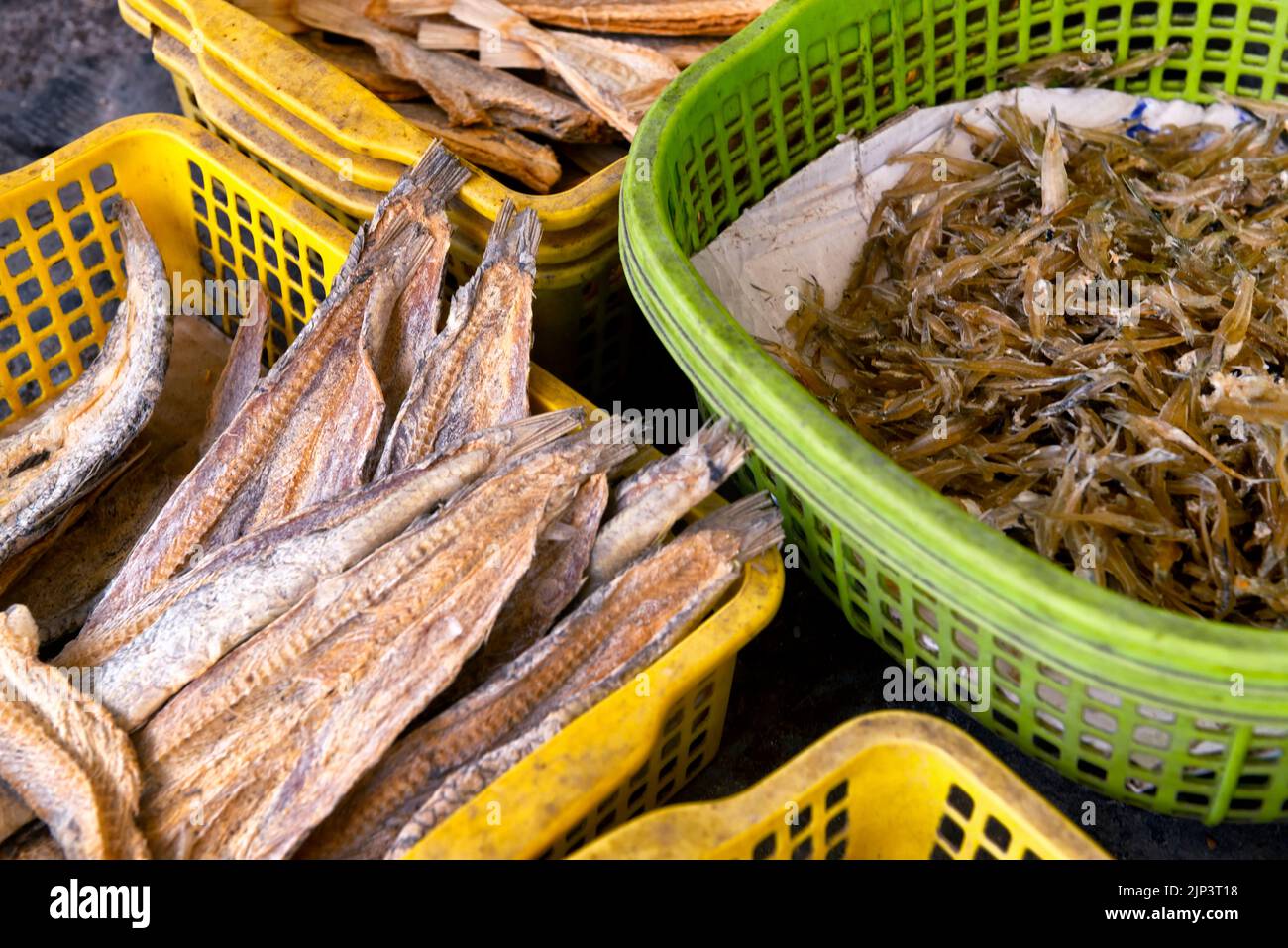 Baskets of dried fish Stock Photo - Alamy