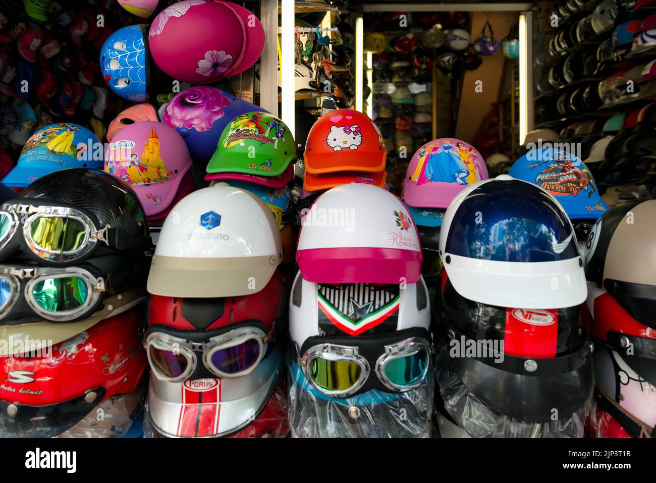 Helmets shop in Vietnam Stock Photo - Alamy