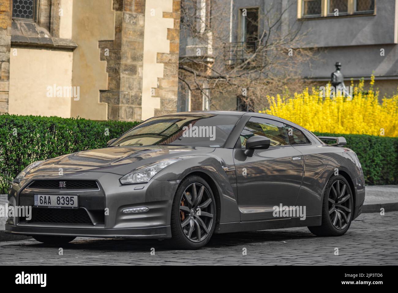A gray Nissan GT-R parked on the side of a road Stock Photo - Alamy