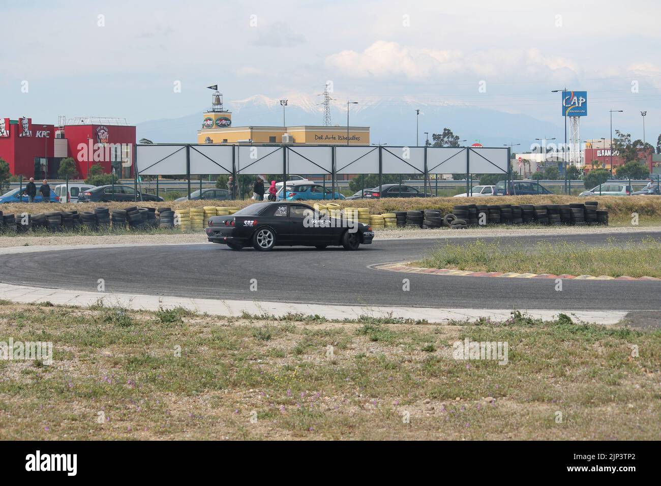 The Nissan Skyline GT-R drifting on a race track Stock Photo - Alamy