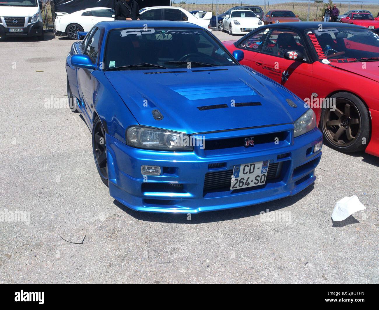 A blue Nissan Skyline GT-R parked outside Stock Photo - Alamy