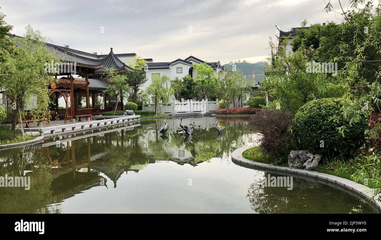 A low-angle view of ancient buildings near the lake Stock Photo - Alamy