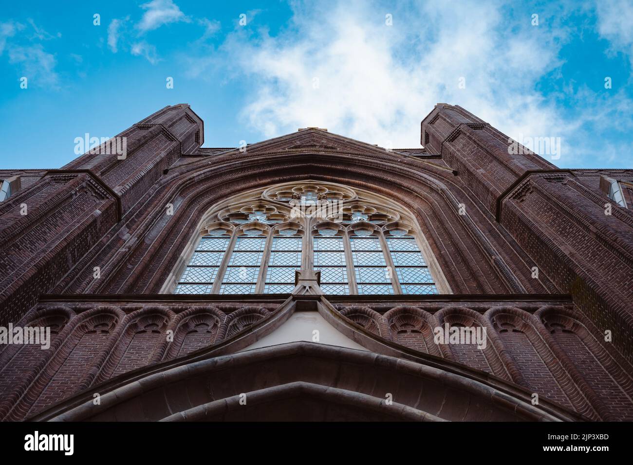 A low-angle shot of the ancient Roman Catholic Church isolated on a ...