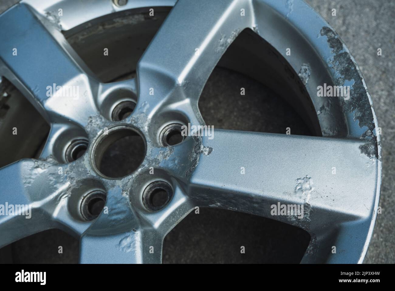 Corrosion on a silver aluminum alloy wheel close-up Stock Photo - Alamy
