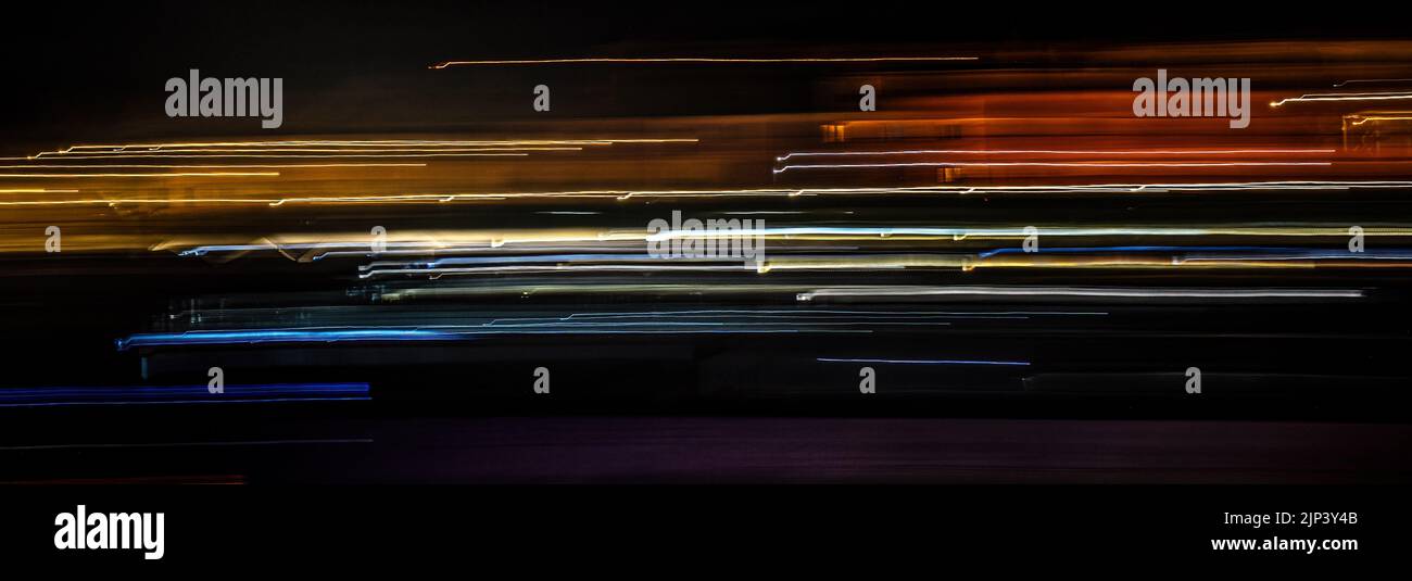 Abstract light trails in the dark, motion blur effect Stock Photo - Alamy