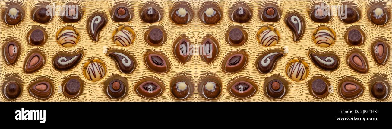 chocolate candies in the box, top view Stock Photo - Alamy