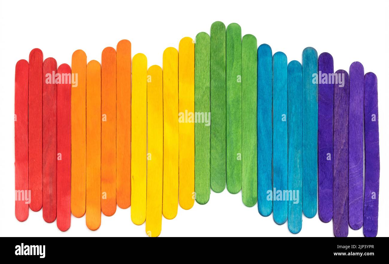 Colorful rainbow wooden popsicles as colors of LGBT flag on white ...