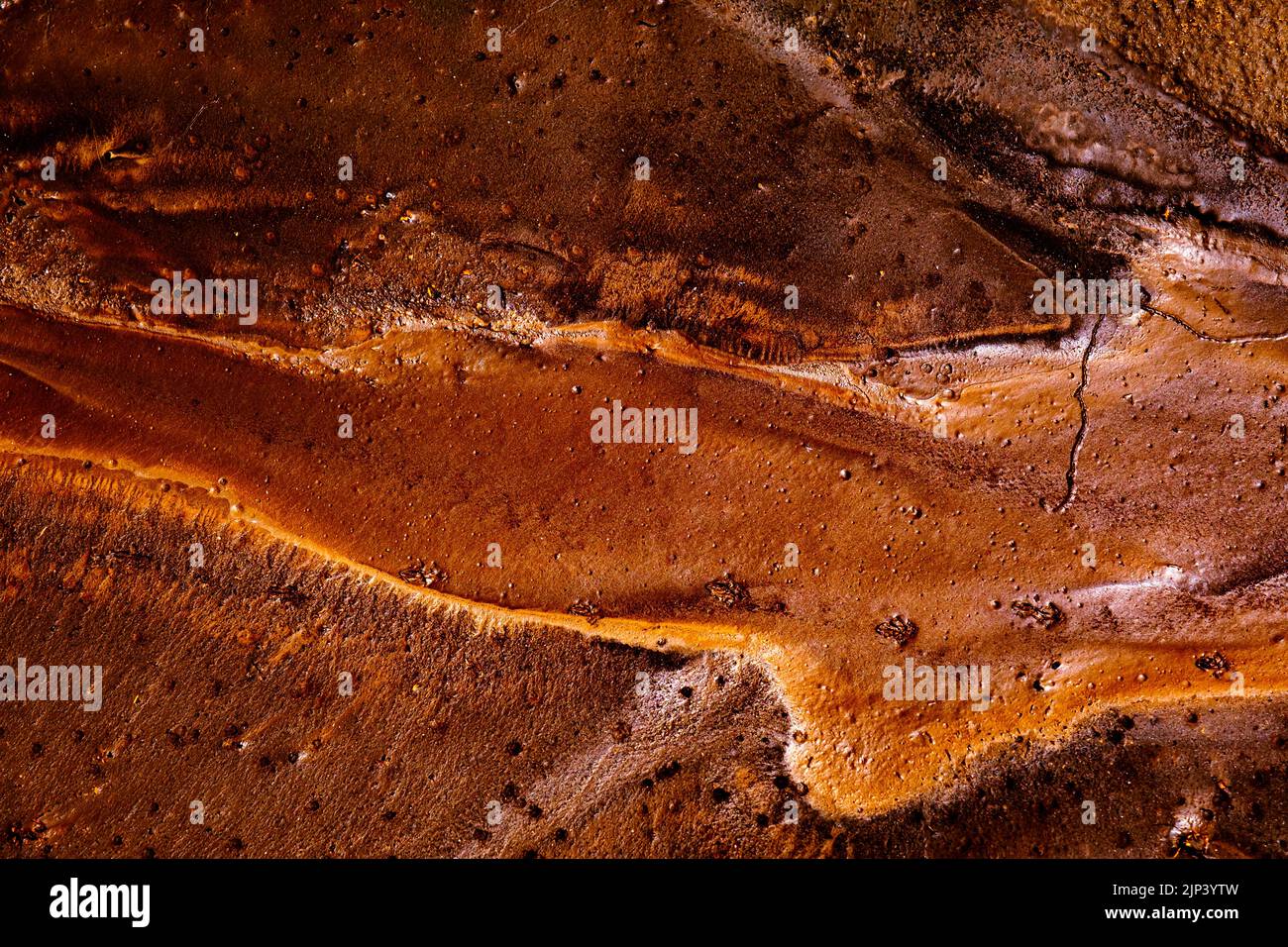 colored mud river, close view Stock Photo - Alamy