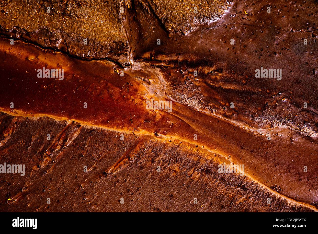 colored mud river, close view Stock Photo - Alamy