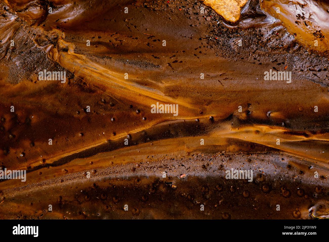colored mud river, close view Stock Photo - Alamy