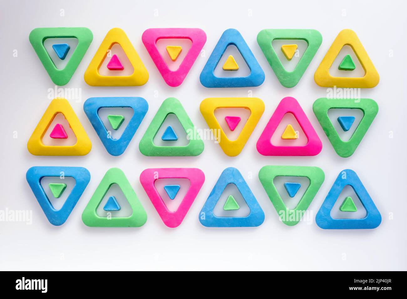 erasers in a triangular shape Stock Photo - Alamy
