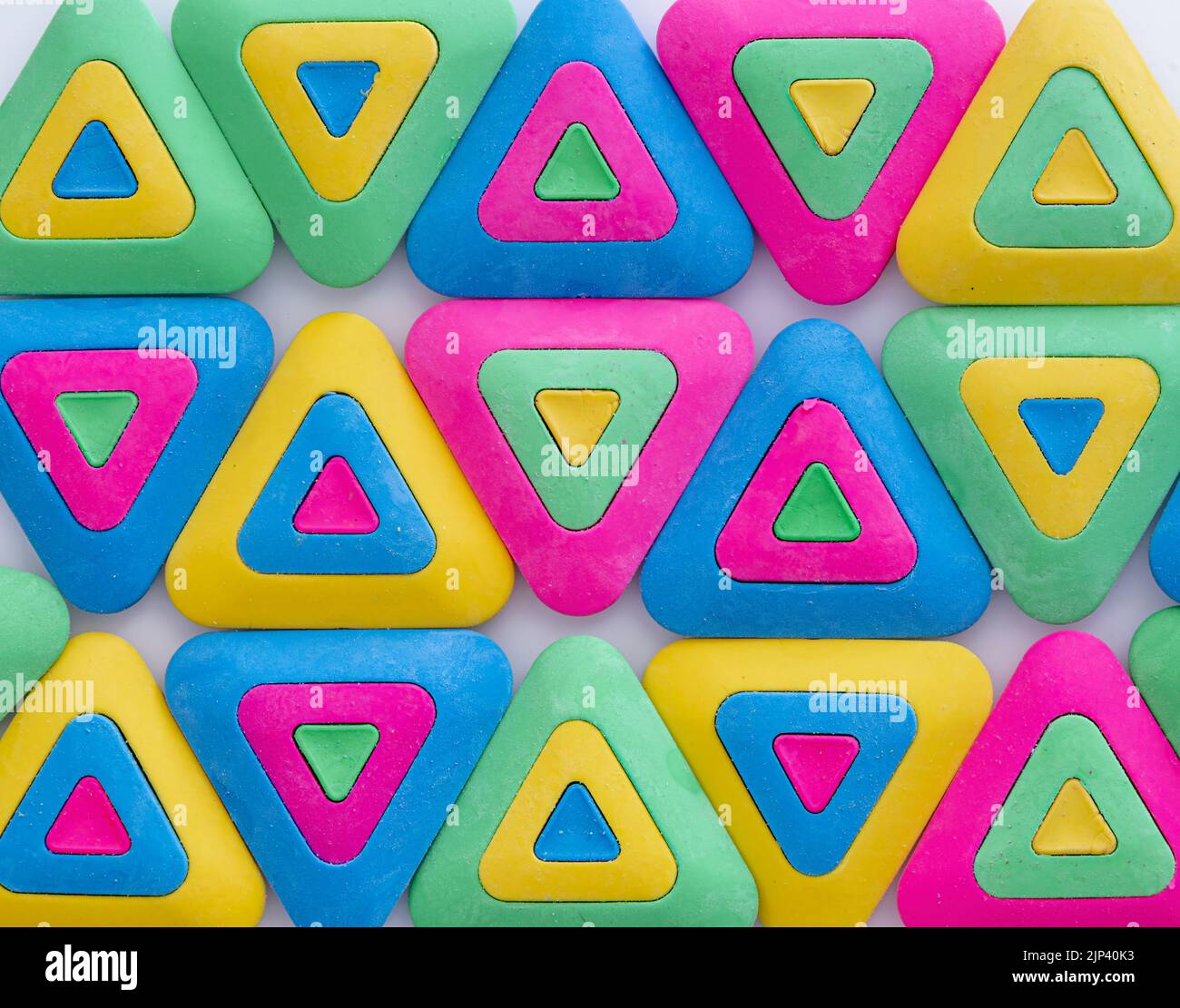 erasers in a triangular shape Stock Photo - Alamy
