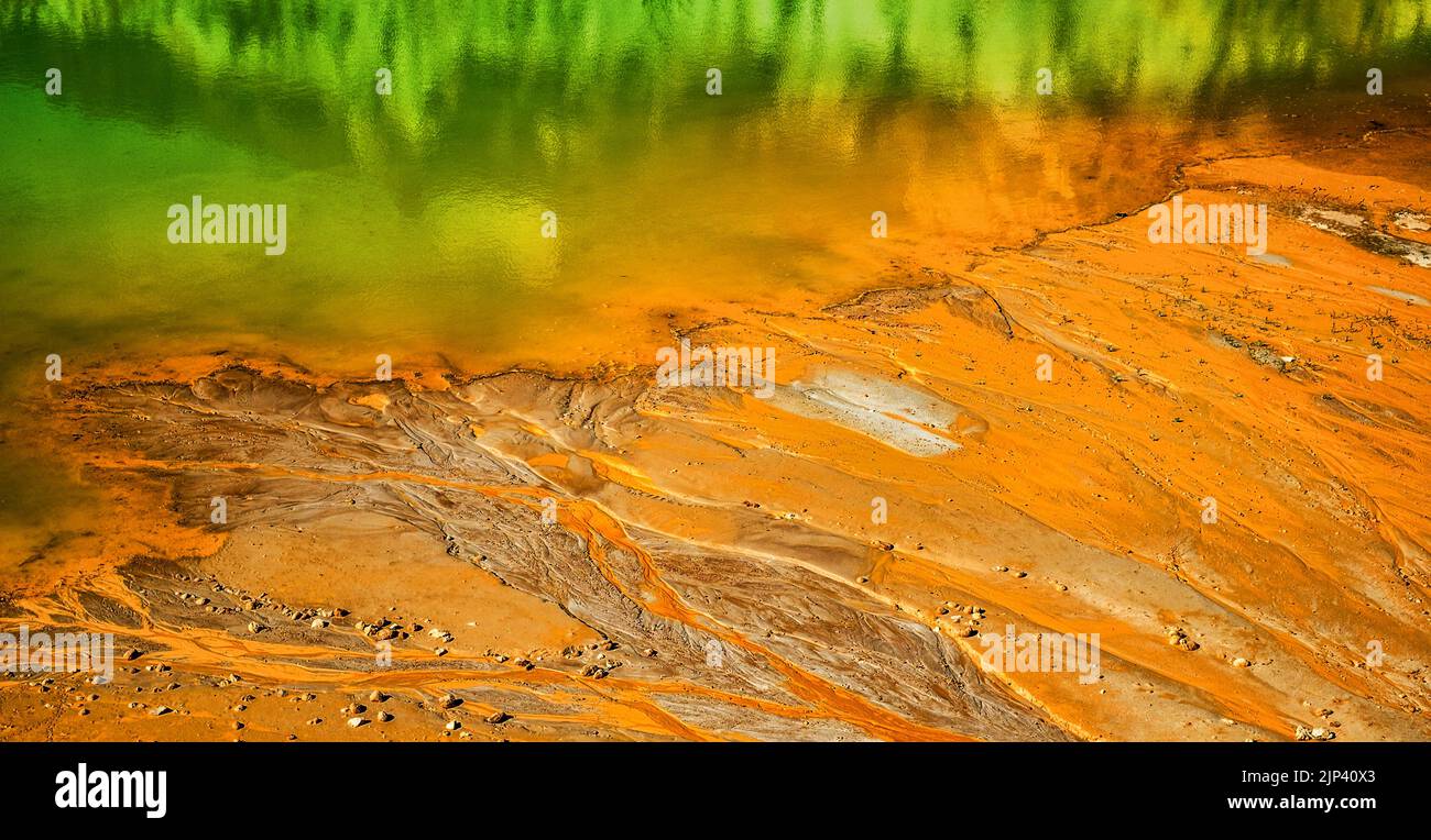 the edge of the lake polluted with toxic mining chemical residuals ...